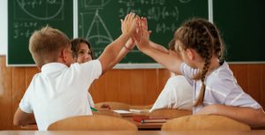 Kids high-fiving: iStock - Entertainment Chronicle